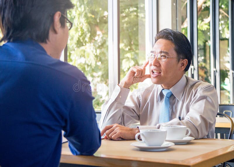 Business Interview Talking Concept, Asian Businessman Talking with ...