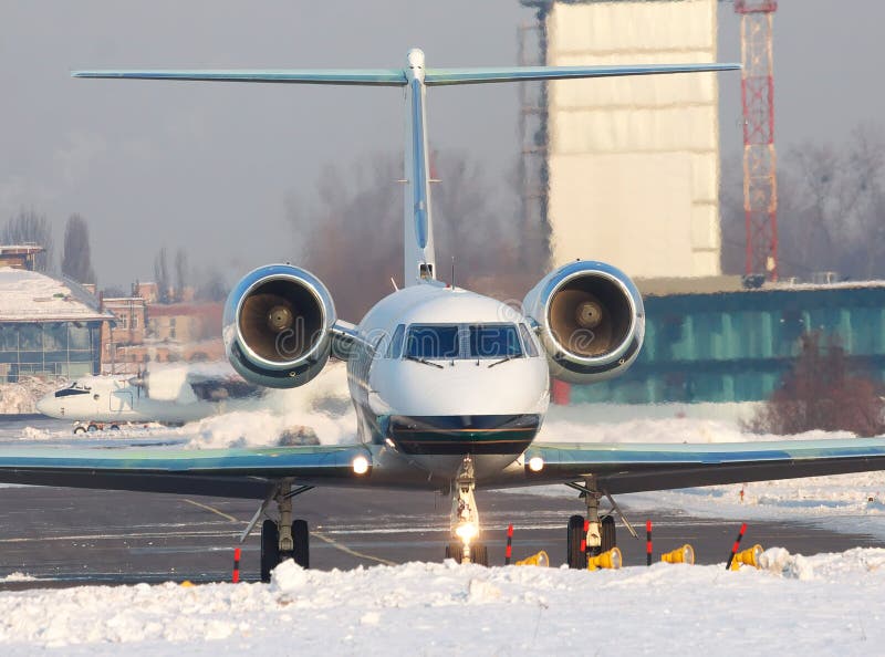 Business jet front view stock image. Image of aviation - 77036701