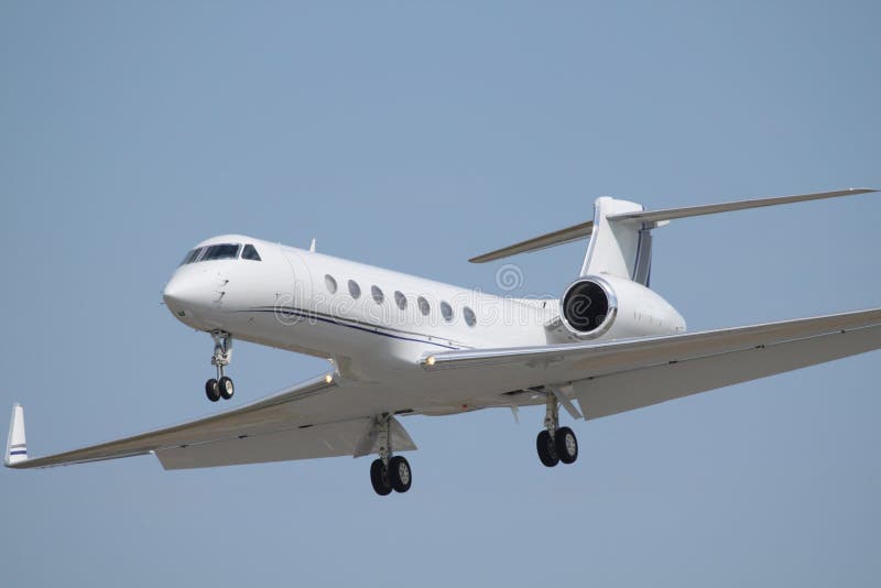 Business jet stock photo. Image of airplane, clouds, embraer - 30413474