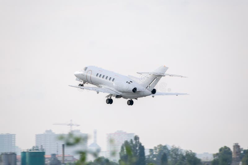 Business jet takeoff stock photo. Image of takeoff, aircraft - 198699558