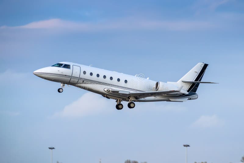 Business jet takeoff stock image. Image of travel, passenger - 198699565