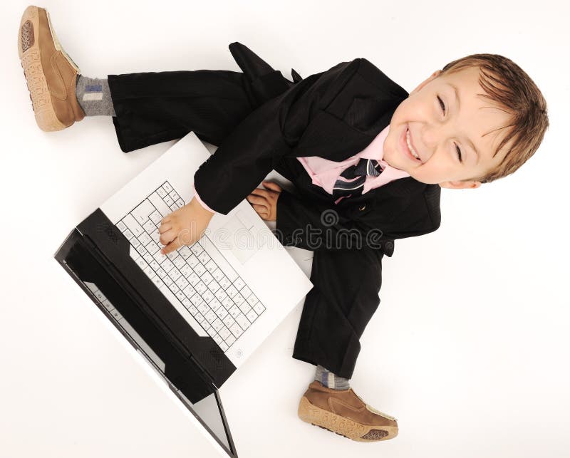 Business kid with laptop stock photo. Image of couch - 29123994