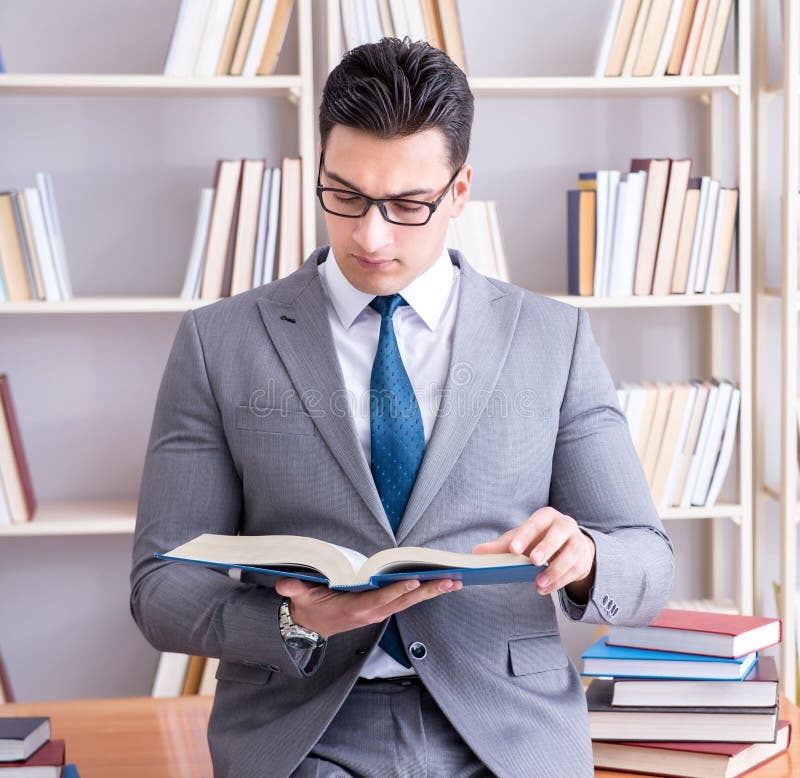 Business Law Student Working Studying in the Library Stock Photo ...