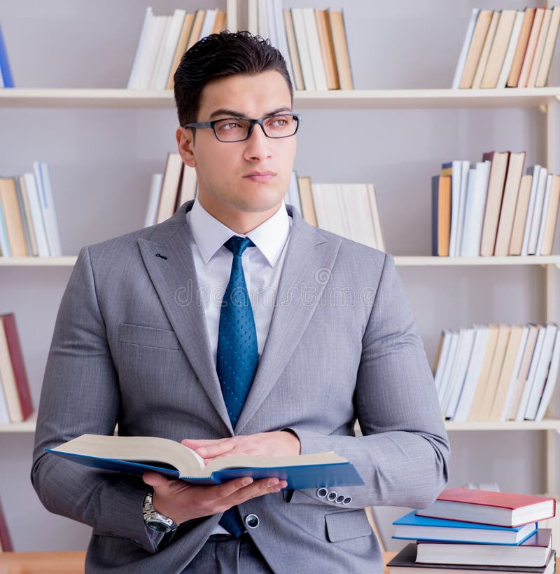 Business Law Student Working Studying in the Library Stock Photo ...