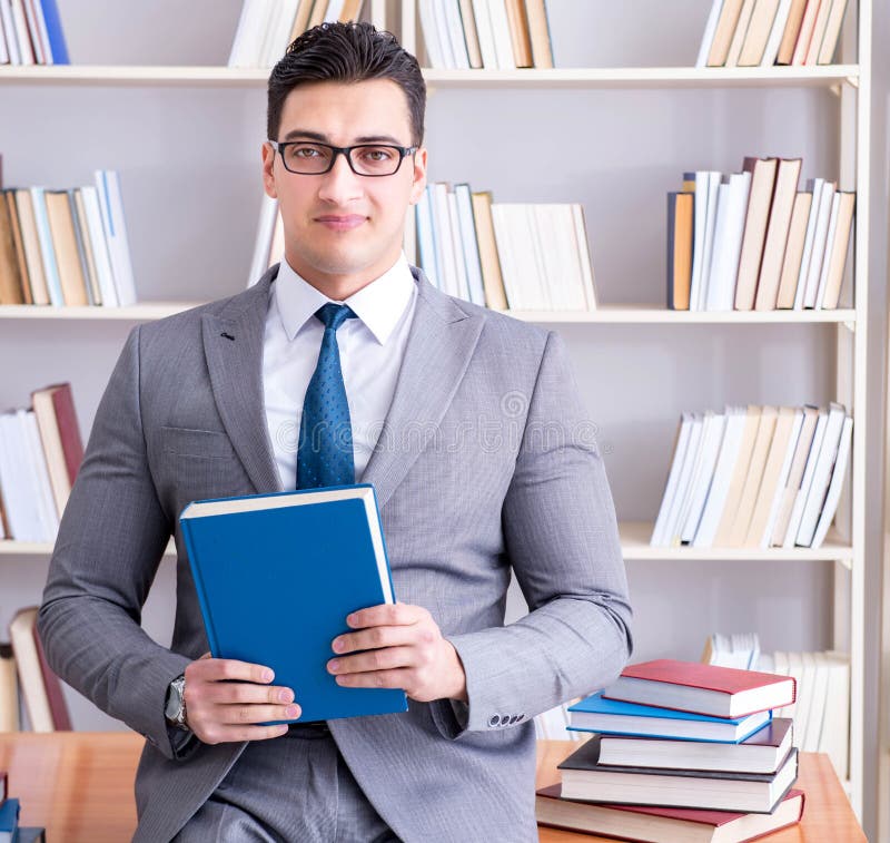 Business Man in Library stock photo. Image of serious - 1594890