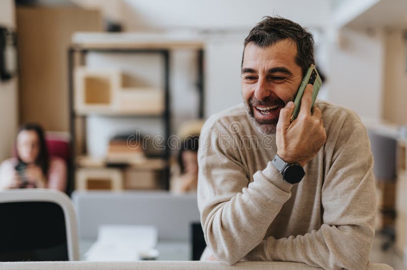 Business Leader Successfully Negotiating with Client during Phone Call ...