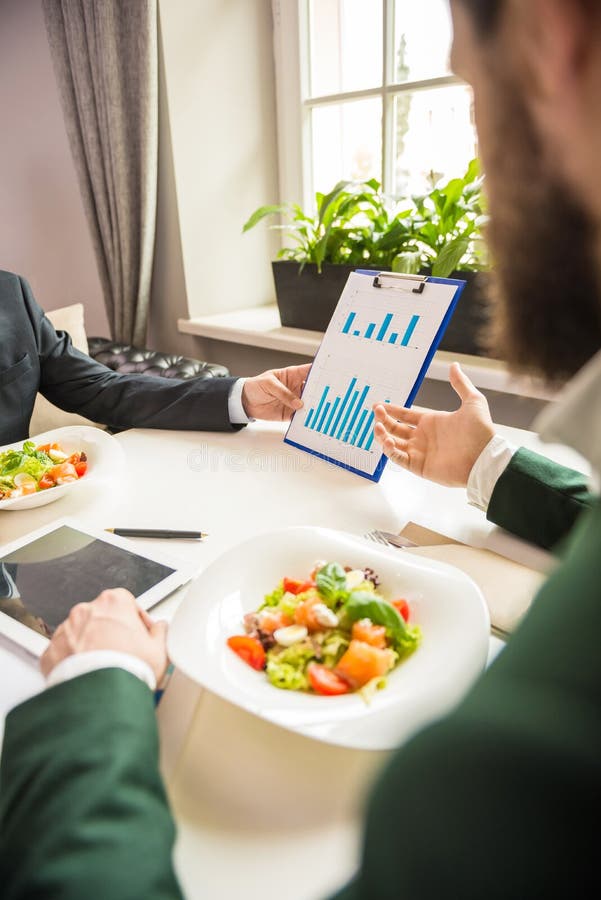Business lunch stock image. Image of graphs, business - 54863103