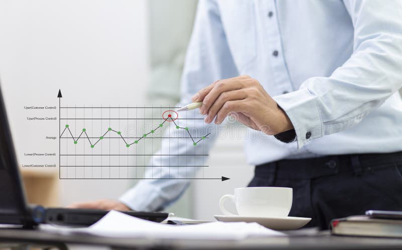 Business Man Analysis Statistical Process Control Chart in Process ...