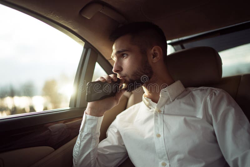 Man in Back Seat of Moving Car Stock Image - Image of contemplation ...