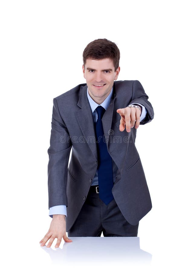 Business Man Behind the Desk Pointing Stock Photo - Image of portrait ...