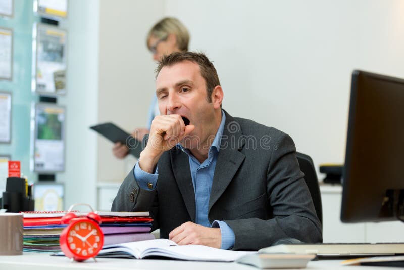 Business man bored at work stock image. Image of people - 257188225