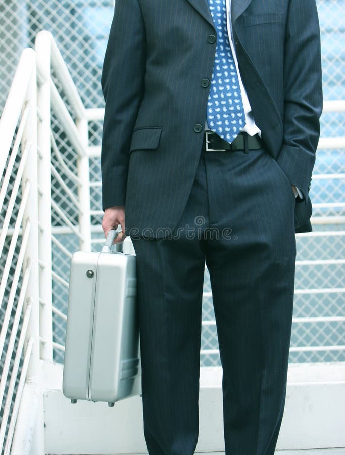 Business Man with Briefcase Stock Image - Image of attire, holding: 79349
