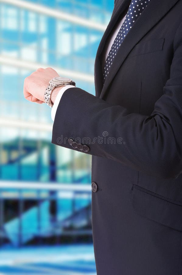 Businessman Checking Time on His Wristwatch. Stock Photo - Image of ...