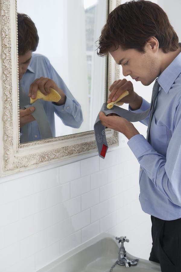 Business Man Cleaning Stain from Tie Stock Photo - Image of male ...