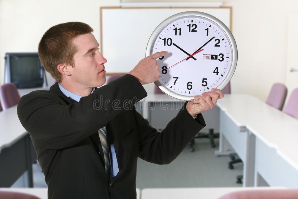 Business Man and Clock stock photo. Image of hour, office - 2420928