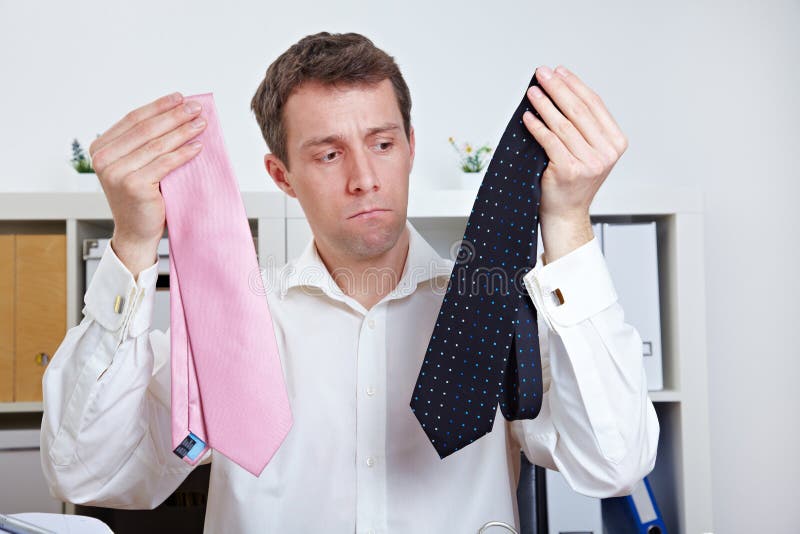 Business Man Comparing Ties Stock Photos - Free & Royalty-Free Stock ...