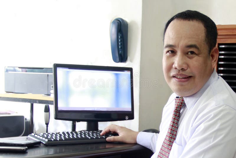 Business man on computer stock photo. Image of communication - 25005212