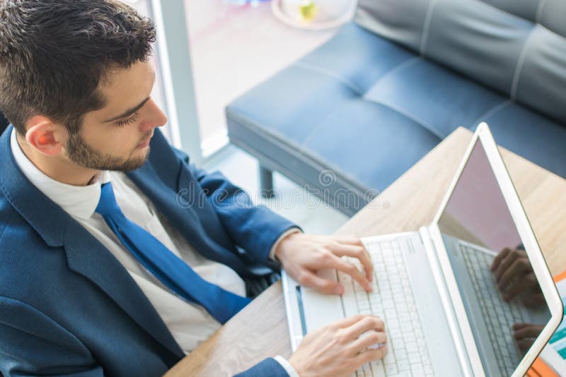 Business man with computer stock image. Image of office - 157219481