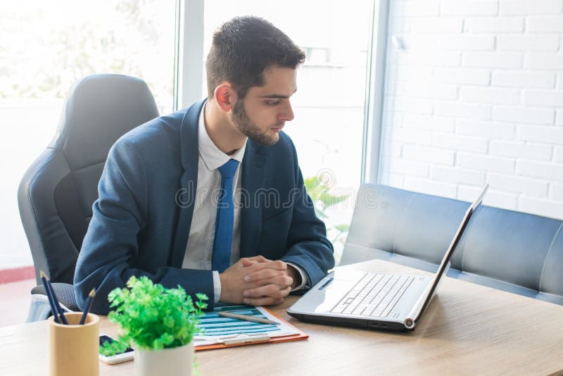 Business man with computer stock image. Image of desk - 157219337