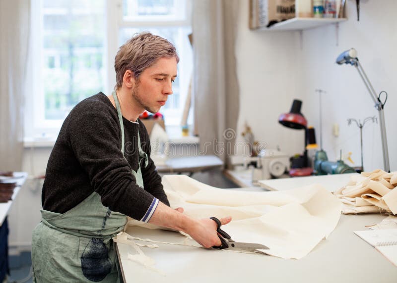 Business. Man Cutting Fabric in His Workshop Stock Image - Image of ...