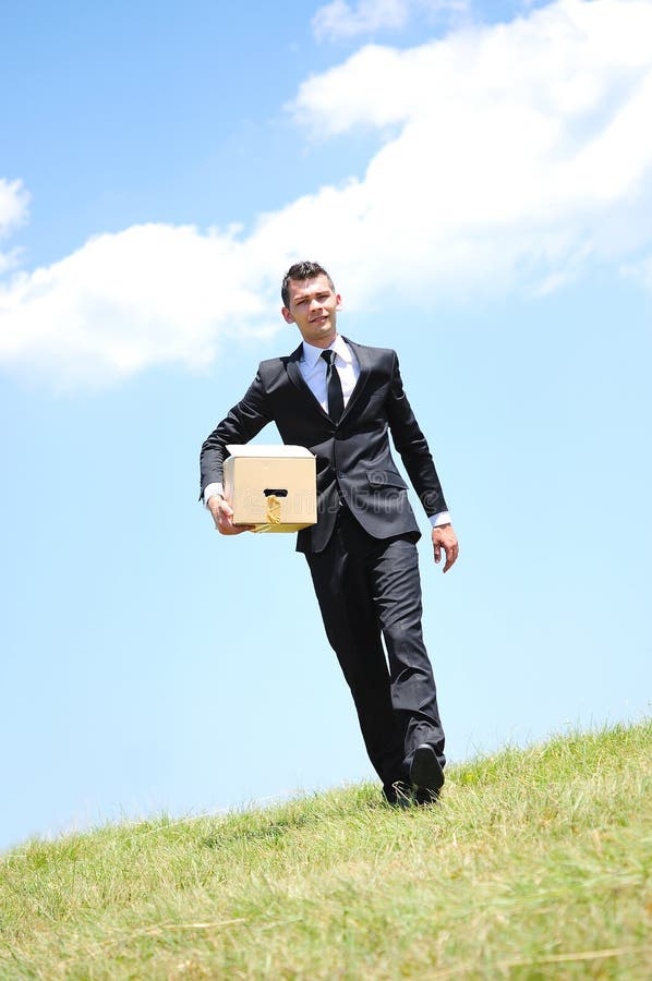 Business Man Delivering Box Stock Image - Image of grass, outdoor: 25800663