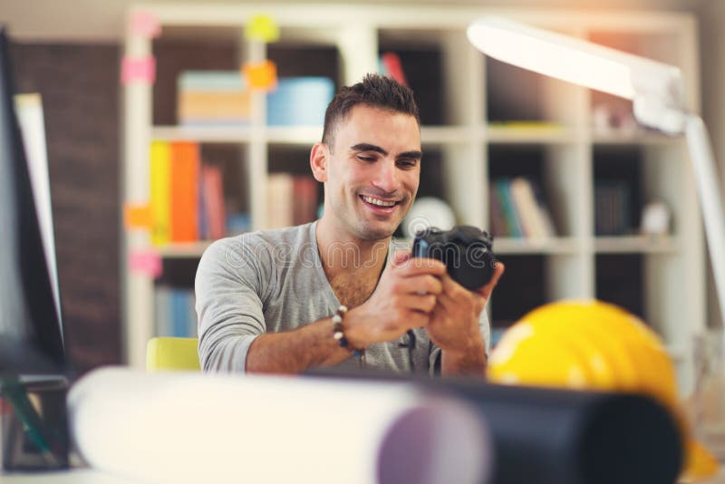 Business Man with Digital Camera at Office Desk Stock Photo - Image of ...