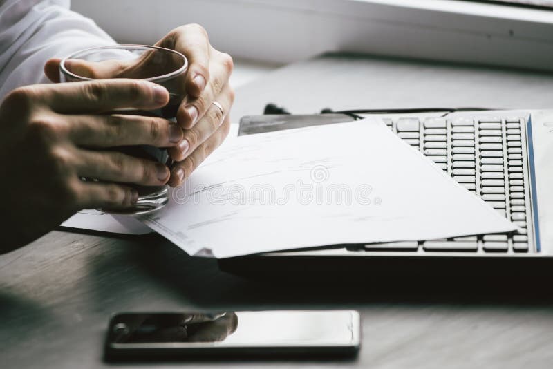 Business Man Drinking Coffee and Using Laptop Computer and Mobil Stock ...
