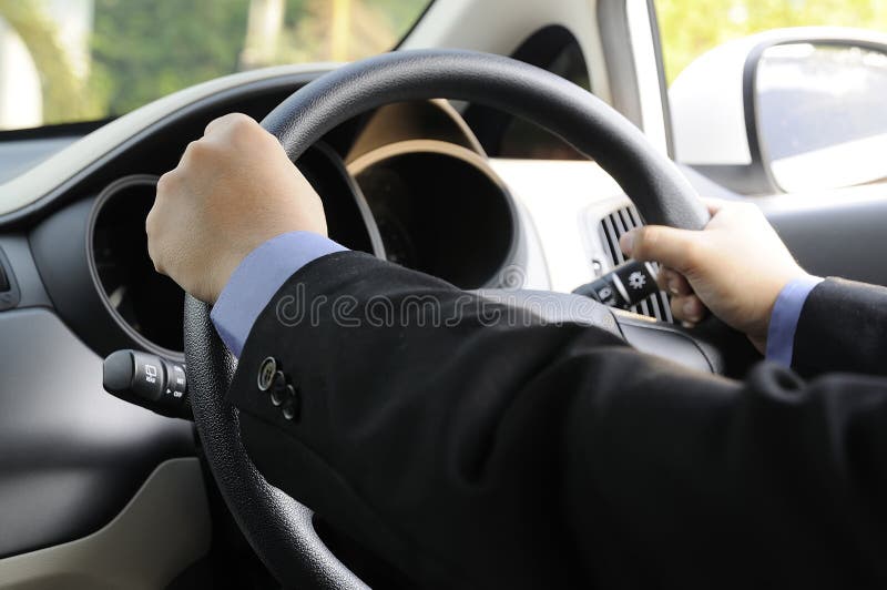 Man Driving Car in City. Driver Holding Steering Wheel. Stock Photo ...