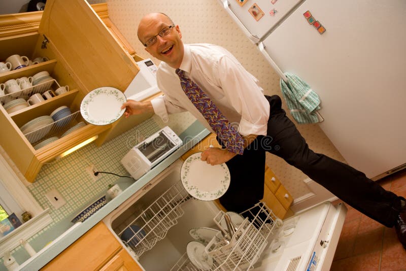 Business Man Emptying Dishwasher Stock Photo - Image of caucasian ...