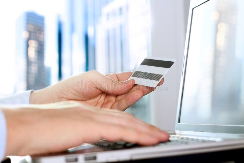 Business Man Entering Data of a Credit Card . on-line Shopping on the ...