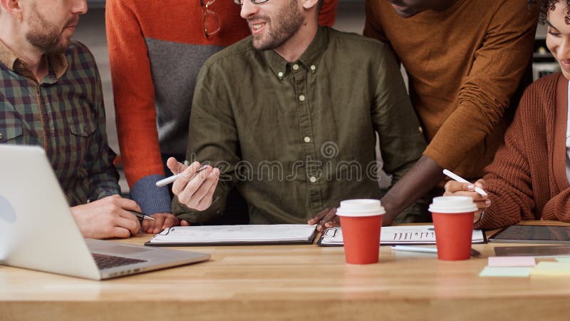 Business Man Explaining Something To His Colleagues . Stock Photo ...