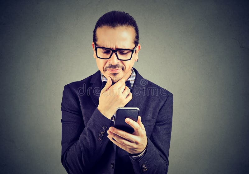 Man with Smartphone in Misunderstanding Stock Image - Image of ...