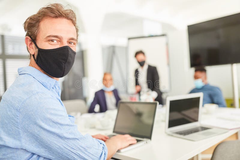 Business Man with Face Mask on Laptop Stock Photo - Image of business ...
