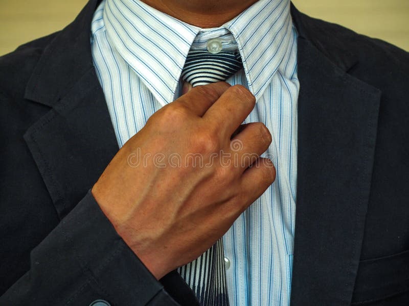 Business Man Fixing His Suit Stock Photo - Image of shirt, adjusting ...