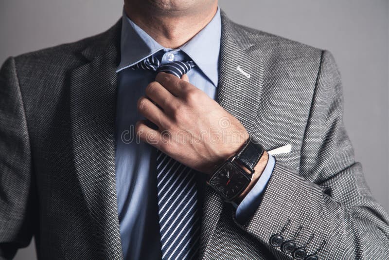 Business Man Fixing His Tie Stock Image - Image of elegant, model ...