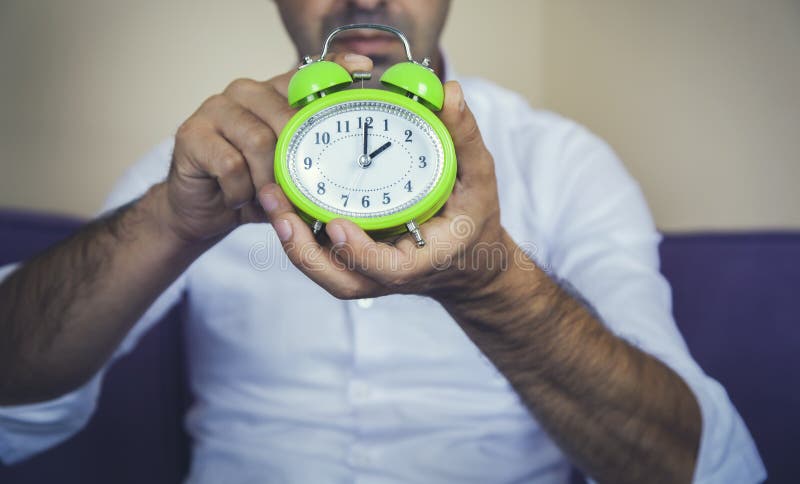 Man hand clock stock photo. Image of retro, people, bedroom - 161596942