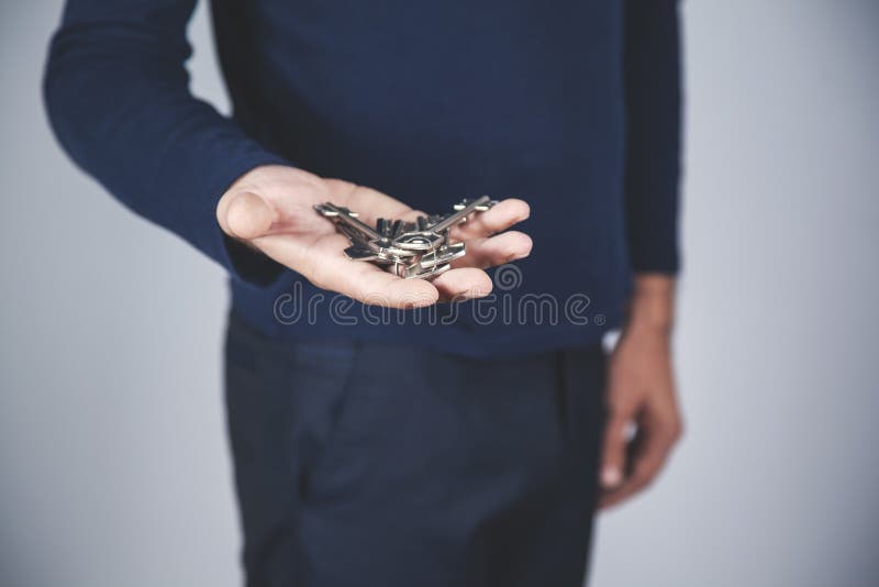 Business man hand keys stock photo. Image of door, agent - 176591802