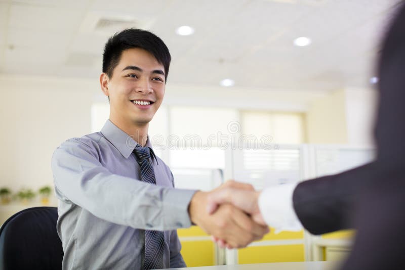 Business man hand shaking stock photo. Image of gesture - 56540140