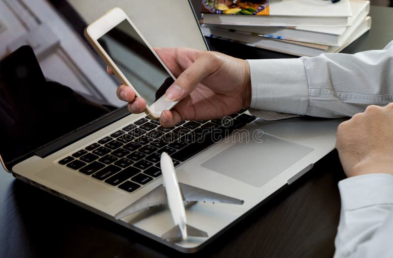 Business Man Hand Using Phone on Laptop Computer. Stock Image - Image ...