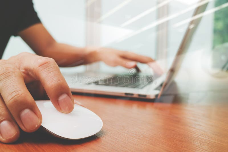 Business Man Hand Working on Laptop Computer on Wooden Desk As Stock ...