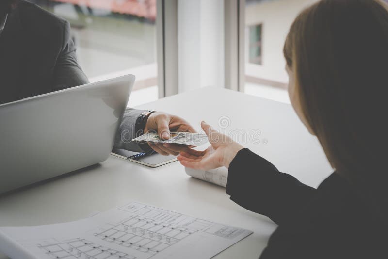 Business Man Handing Money Over a Business Dealing Stock Photo - Image ...
