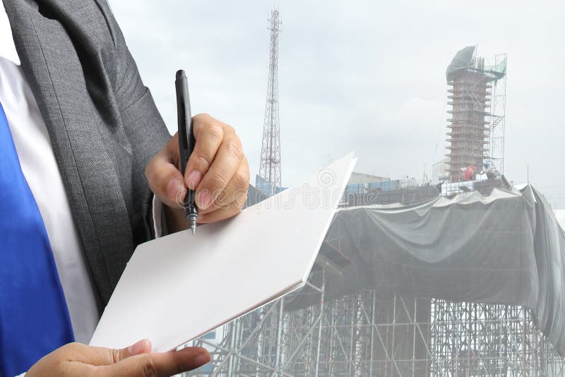 Business Man and High Building Construction Project for Real Estate ...