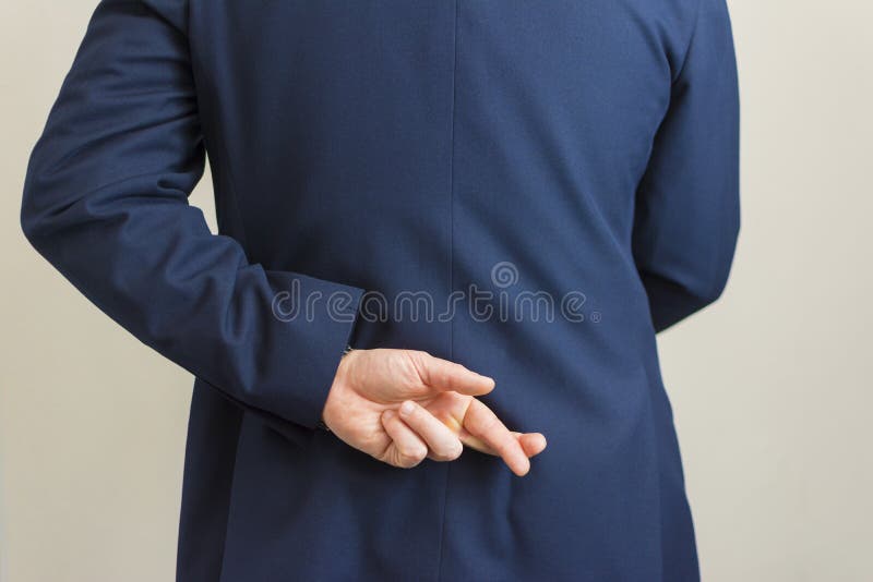 View of Business Man with His Hands Behind His Back and Fingers Crossed ...