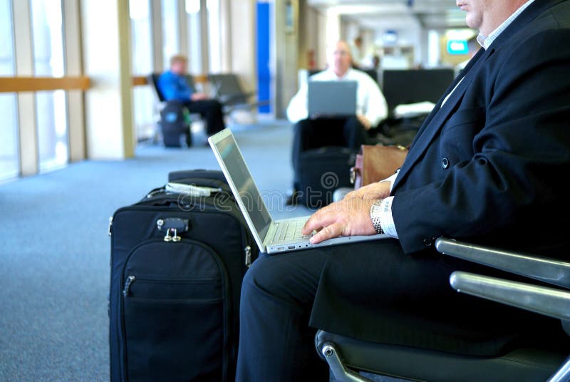 Business Man on His Laptop in the Airport Stock Photo - Image of ...