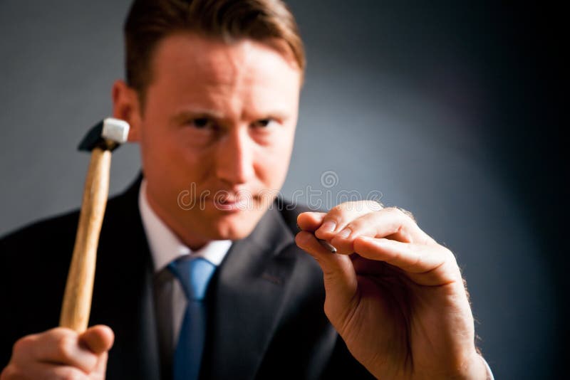 Business Man `hitting Nail on the Head` Stock Image - Image of hitting ...