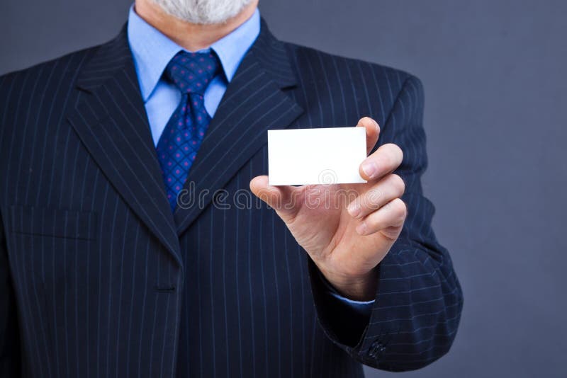 Business Man Holding Blank Card Stock Photo - Image of studio, grey ...