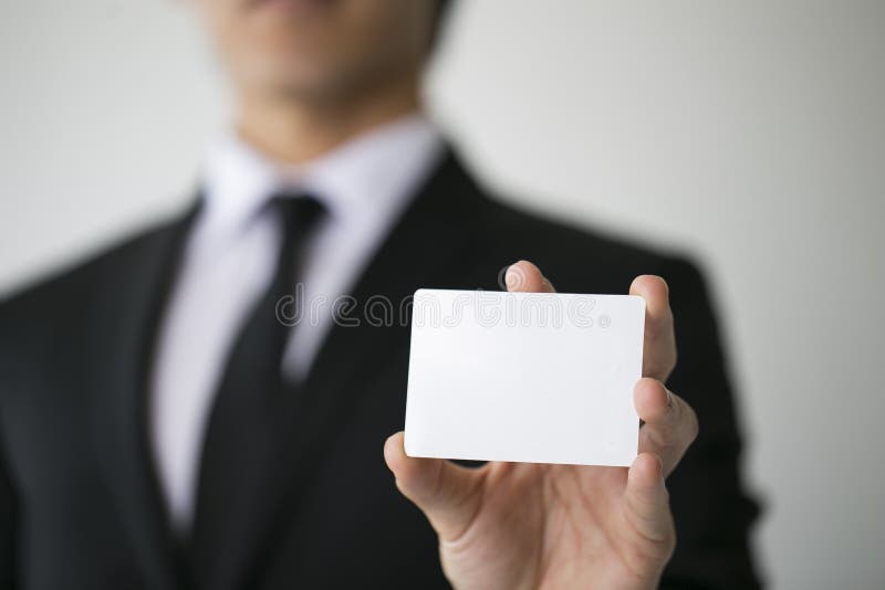 Business man holding card stock image. Image of message - 33310789