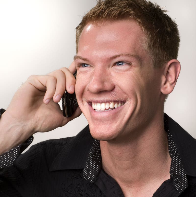 Business Man Holding Cell Phone Stock Image - Image of smiling, male ...