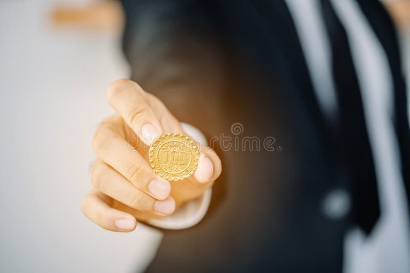 Business man holding coin stock photo. Image of investment - 101667054