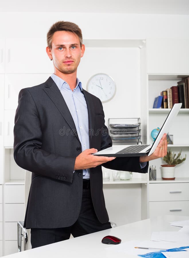 Business Man Holding Computer in Hands Stock Image - Image of business ...